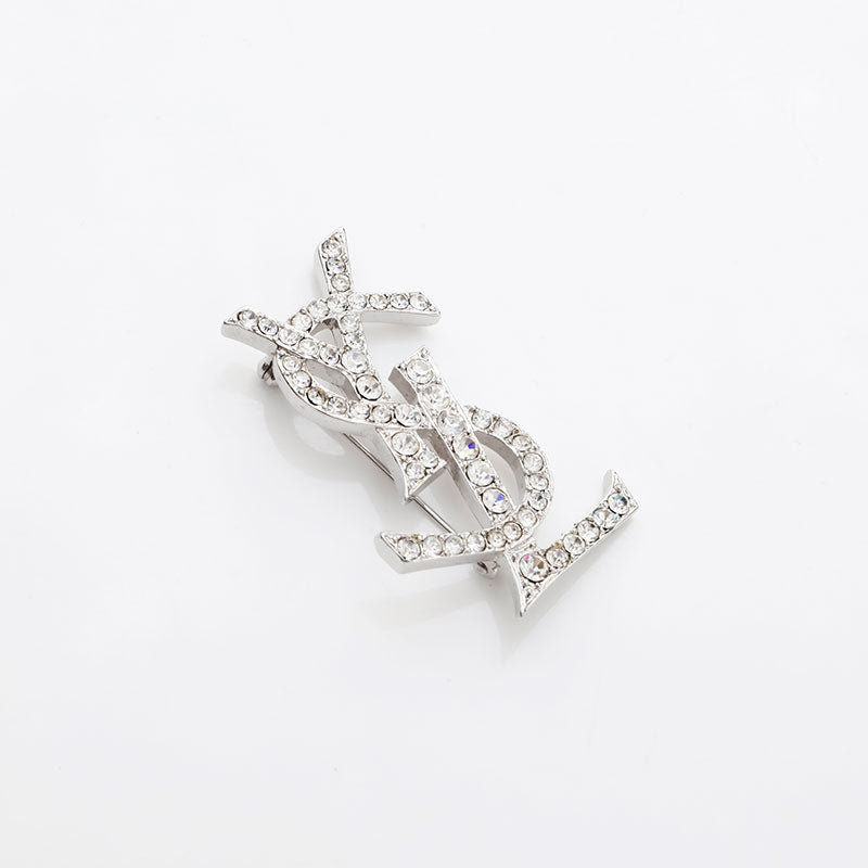 YVES SAINT LAURENT YSL logo rhinestone Brooch gold WS22946 – NUIR VINTAGE